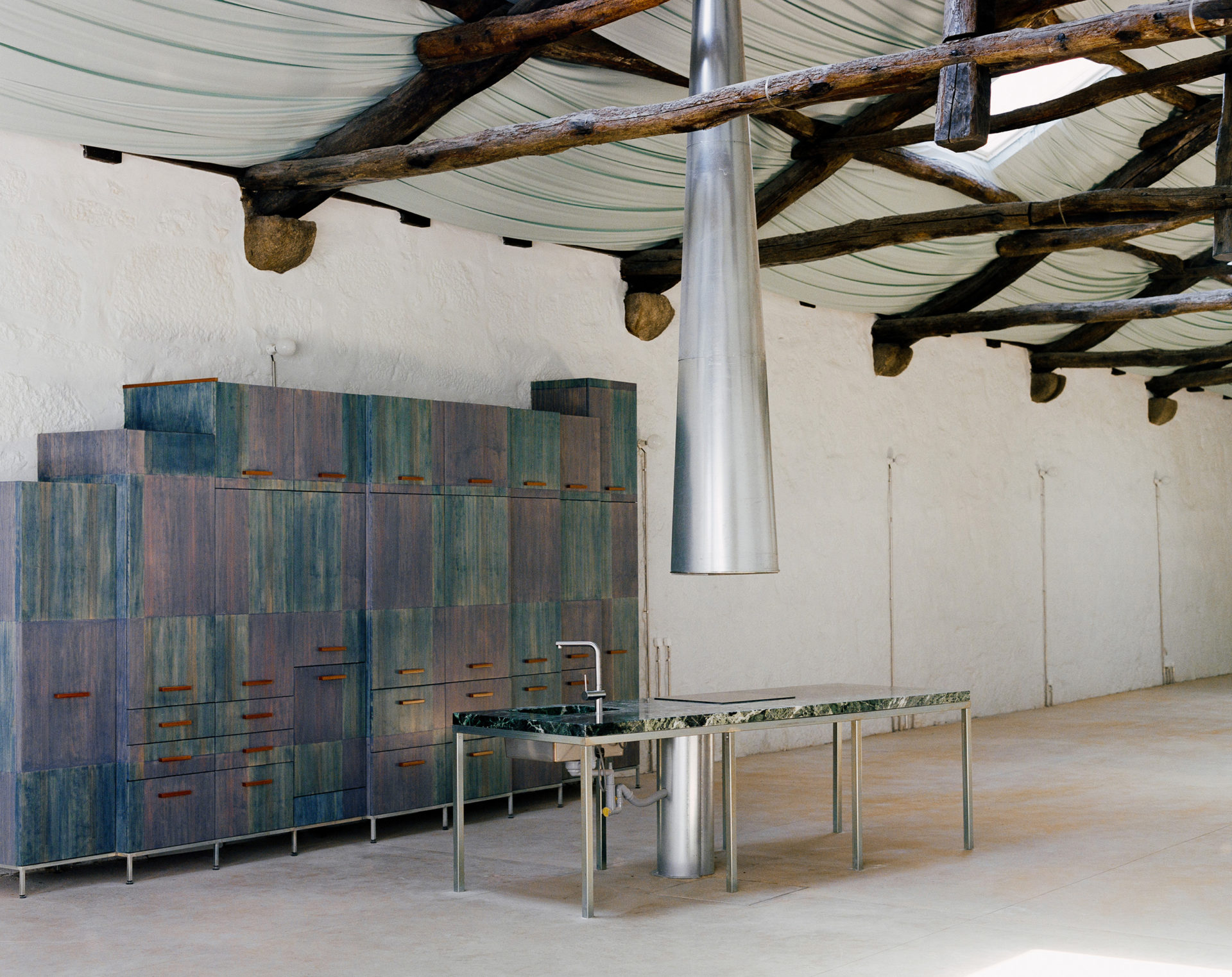 fala atelier works its strange magic on a sprawling industrial interior