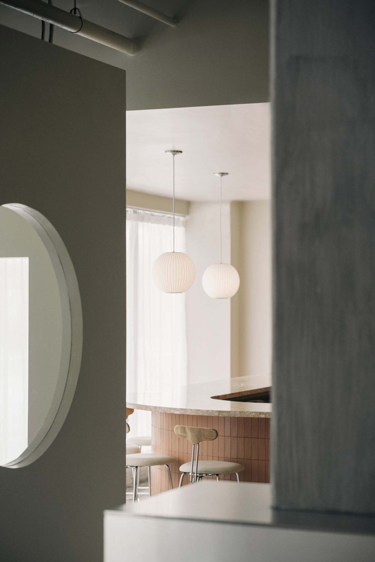 Opposing geometry and materials define Odami’s Hay Sushi